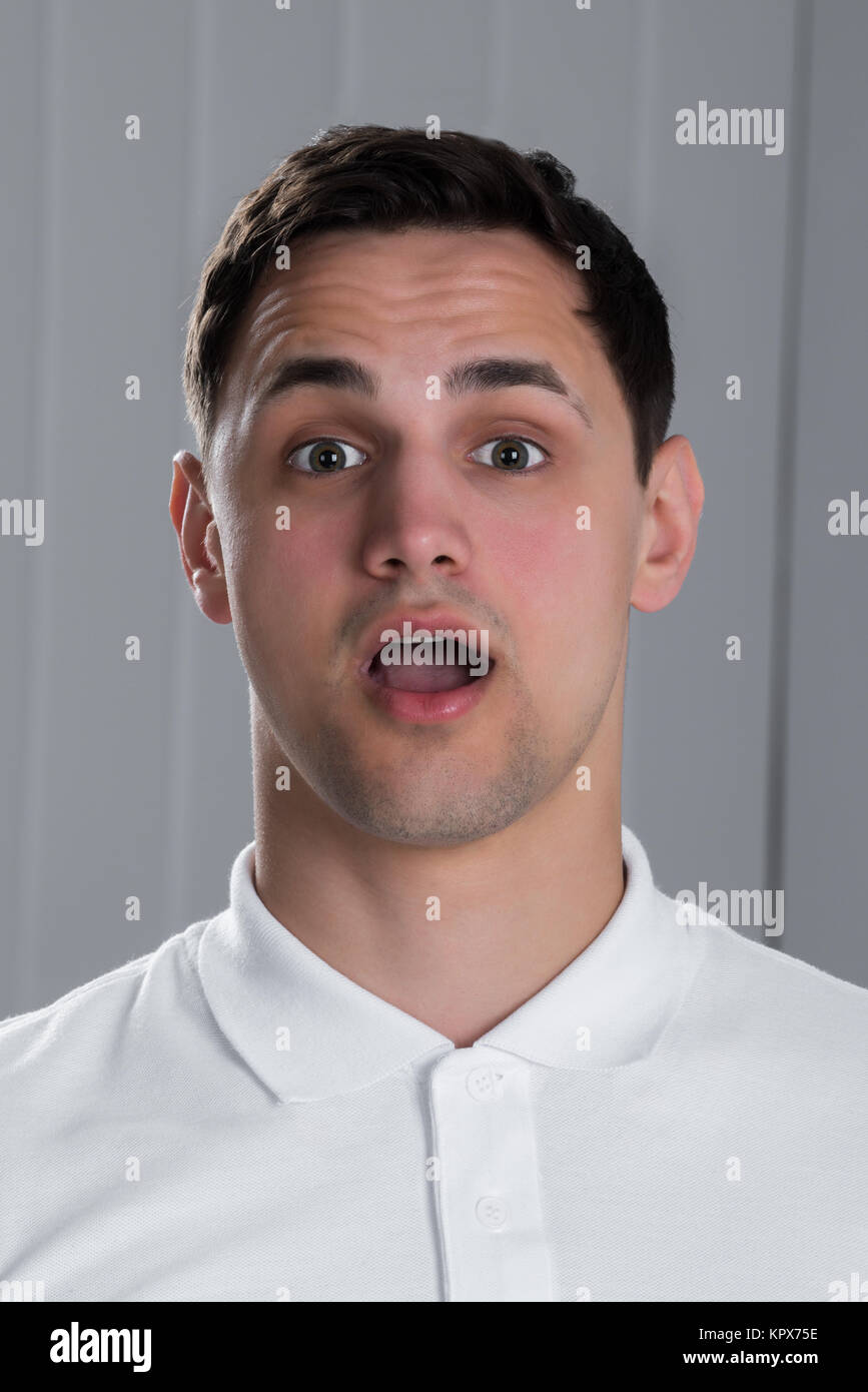 Portrait Of Surprised Man Stock Photo - Alamy