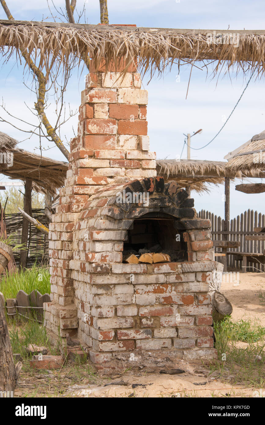 The old Russian oven in the courtyard outdoors Stock Photo - Alamy