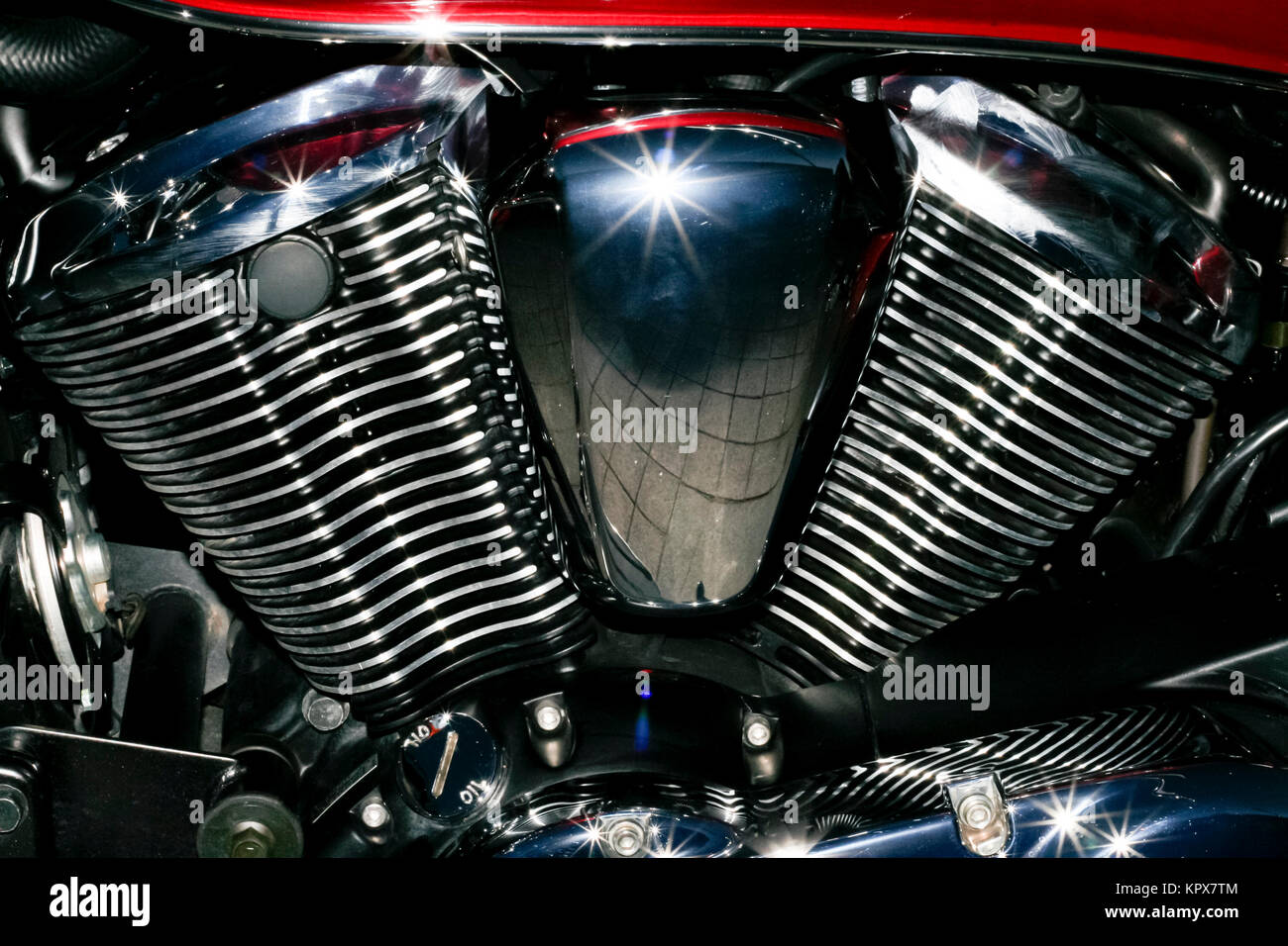 Chromed engine with starry reflections Stock Photo - Alamy