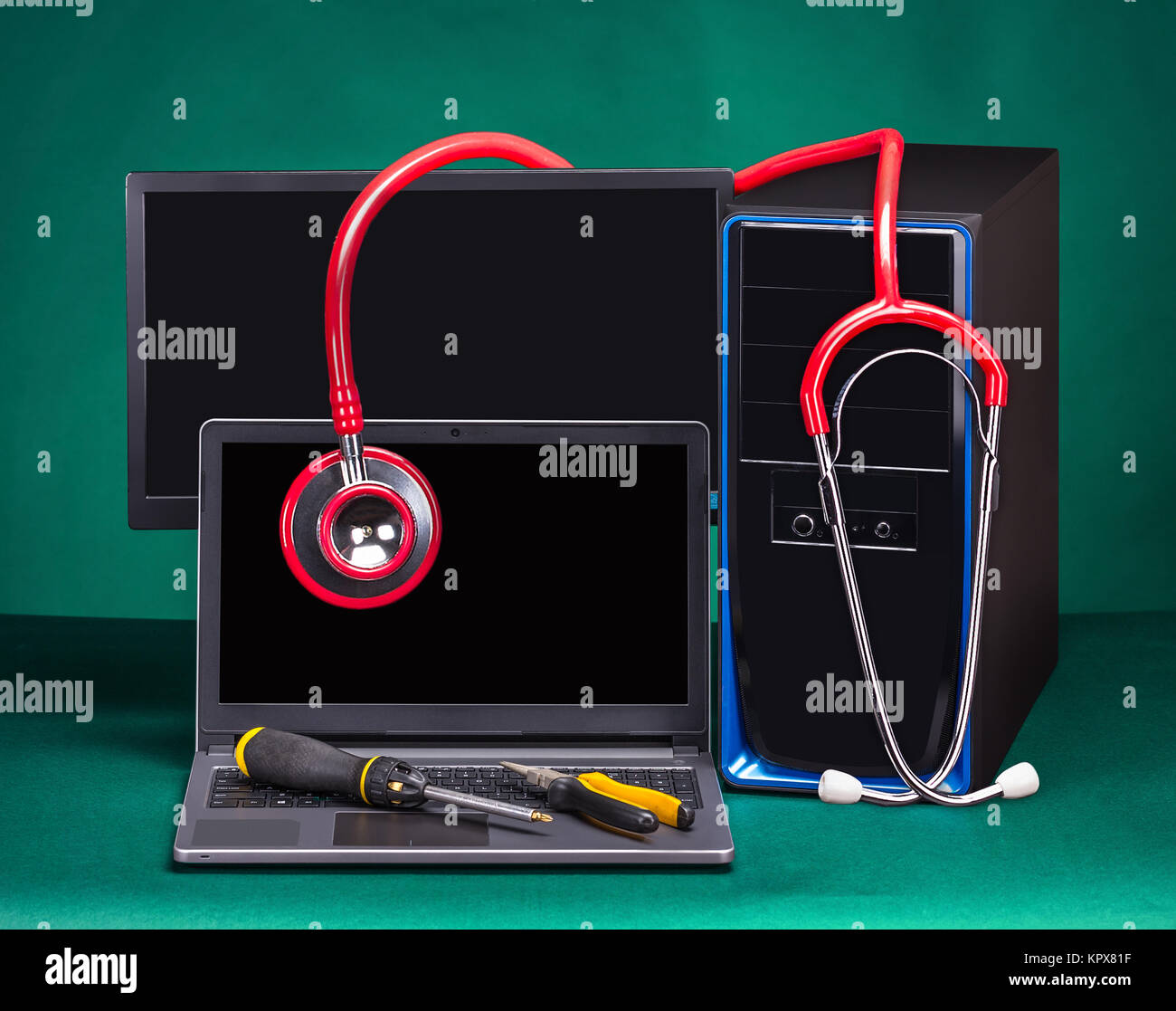 Laptop and pc computer Stock Photo - Alamy