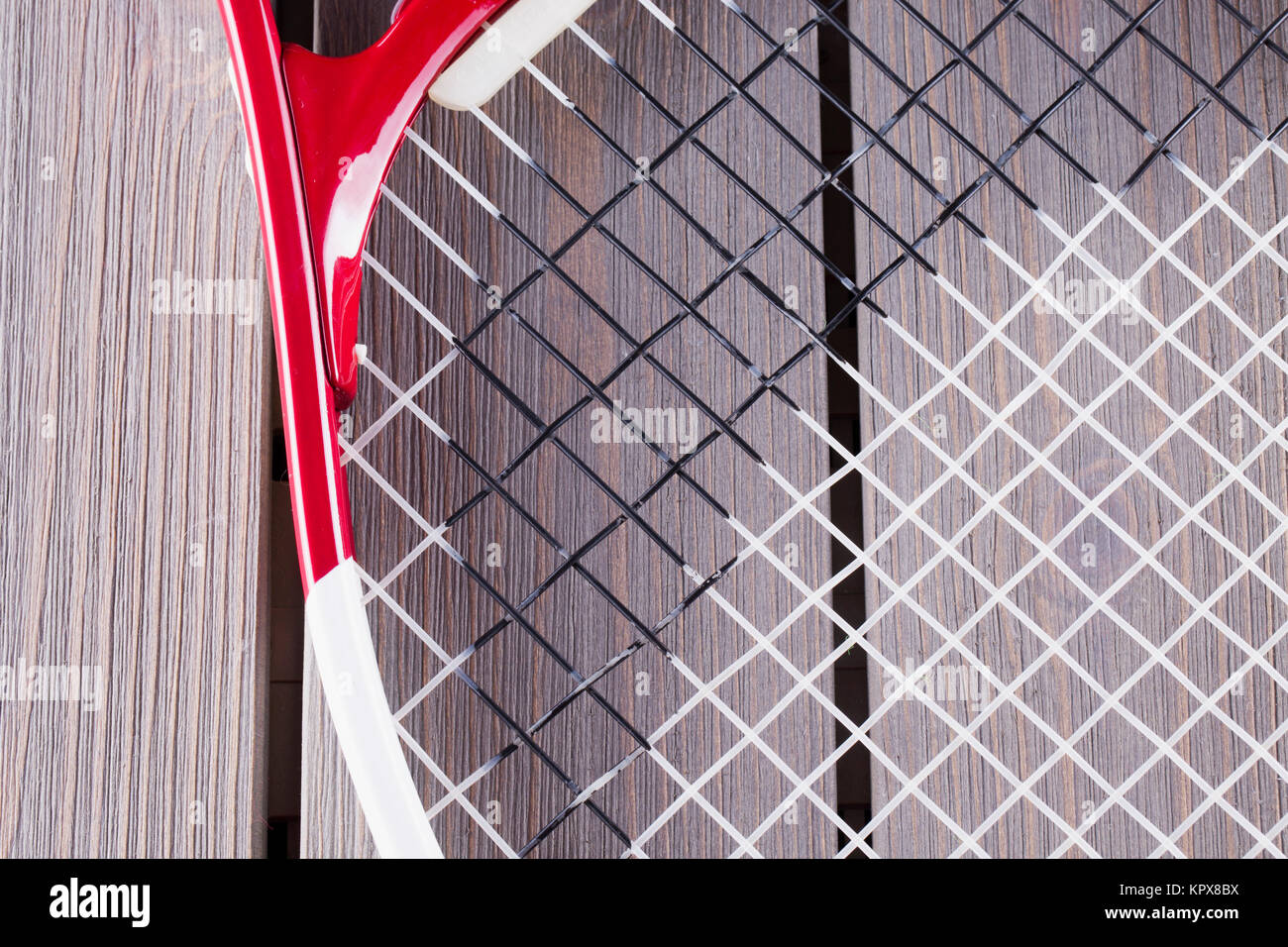 Red and white tennis racket Stock Photo - Alamy