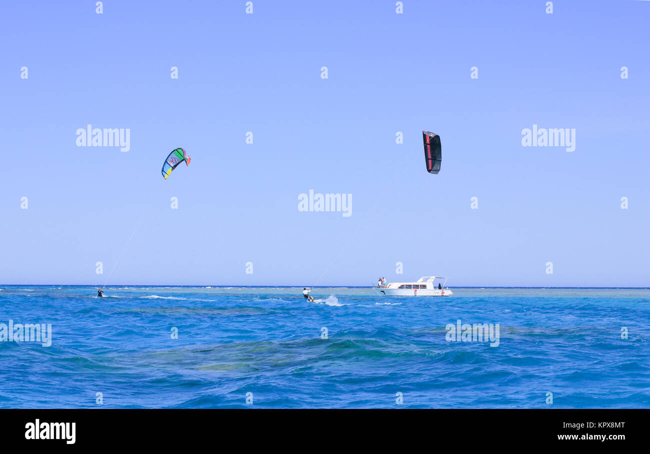 Parasail on blue sky Stock Photo - Alamy