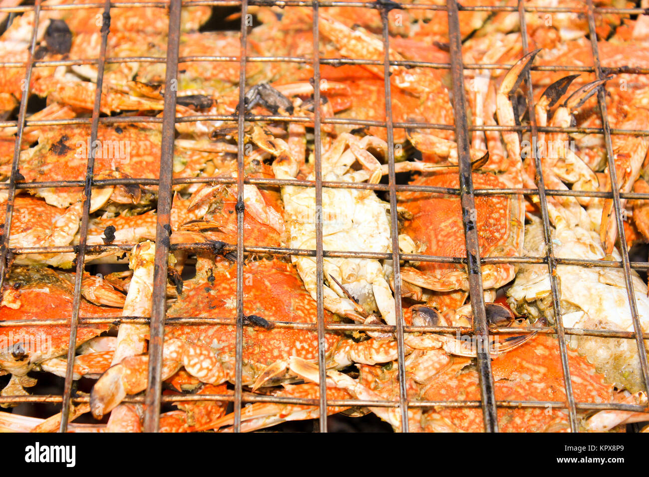 Grilled crab on flaming grill Stock Photo - Alamy