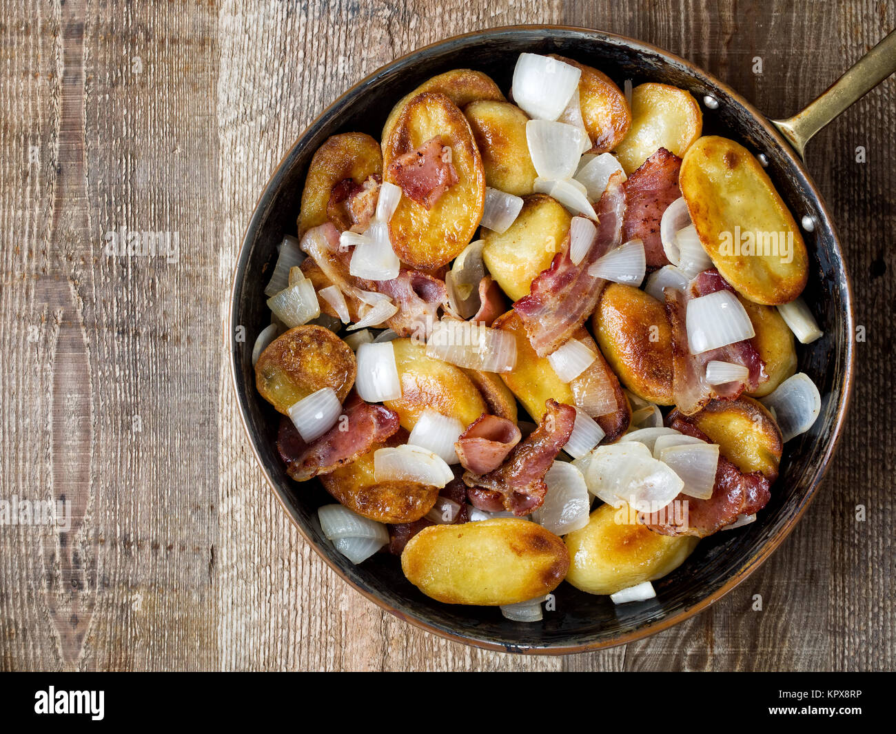 rustic german home fries bratkartoffeln Stock Photo - Alamy