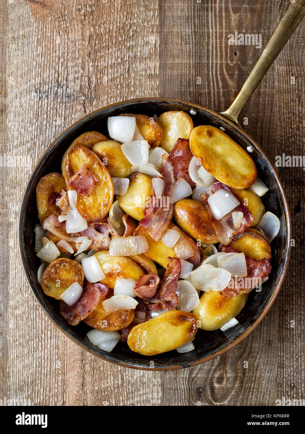 rustic german home fries bratkartoffeln Stock Photo - Alamy