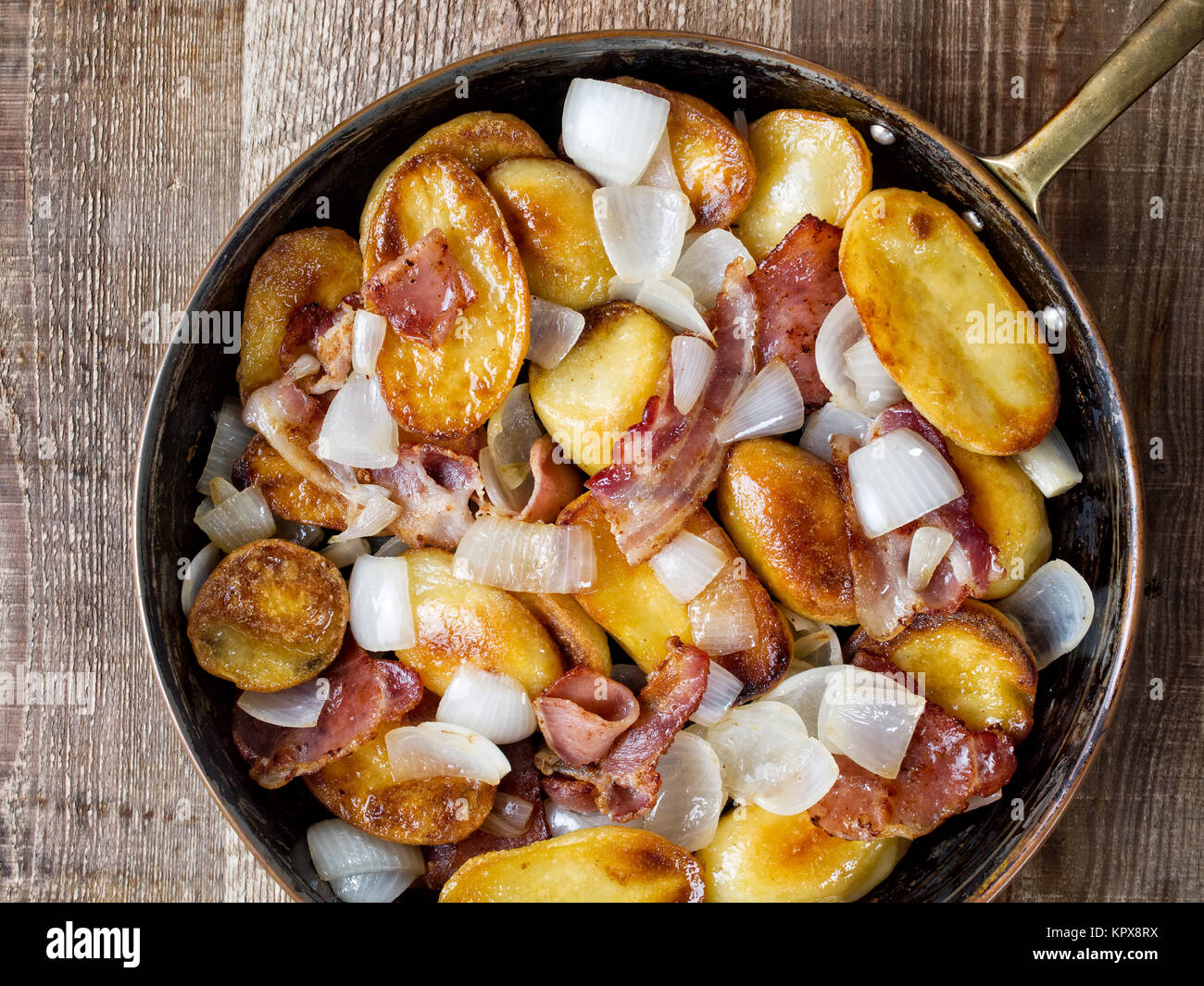 rustic german home fries bratkartoffeln Stock Photo - Alamy