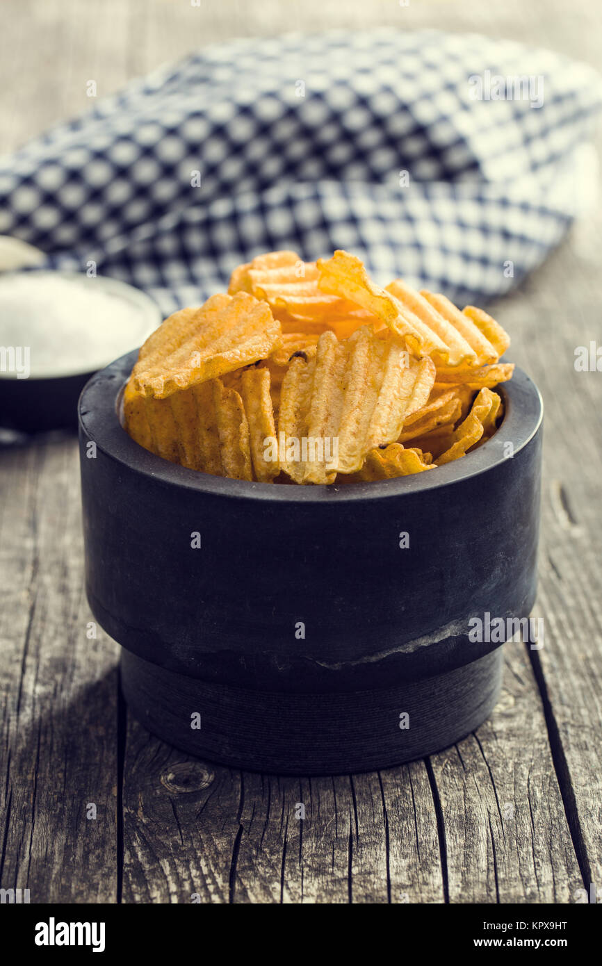 Crinkle cut potato chips Stock Photo - Alamy