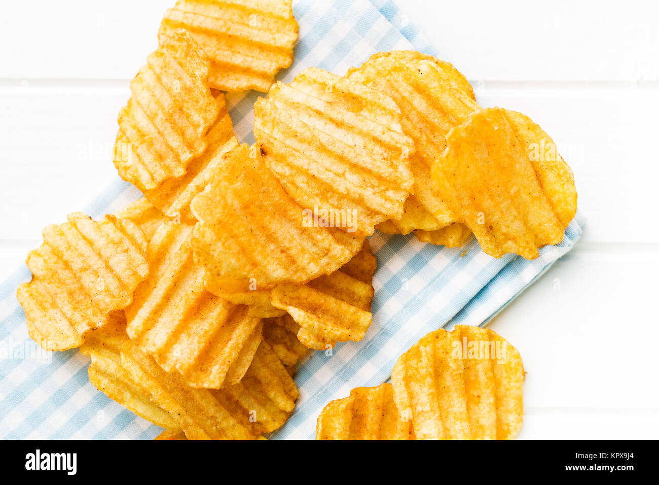 Crinkle cut potato chips Stock Photo - Alamy
