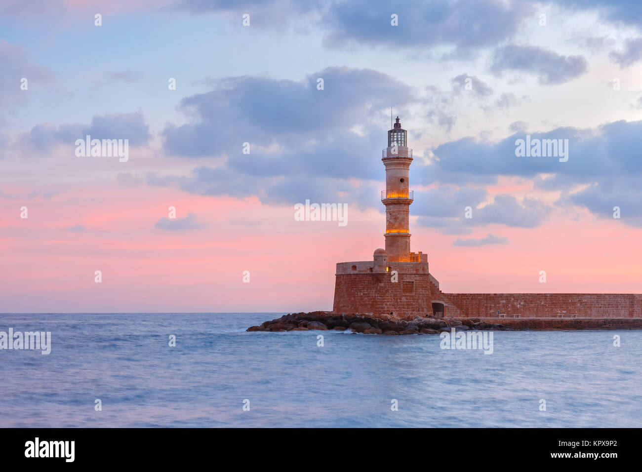 Lighthouse at sunset, Chania, Crete, Greece Stock Photo - Alamy