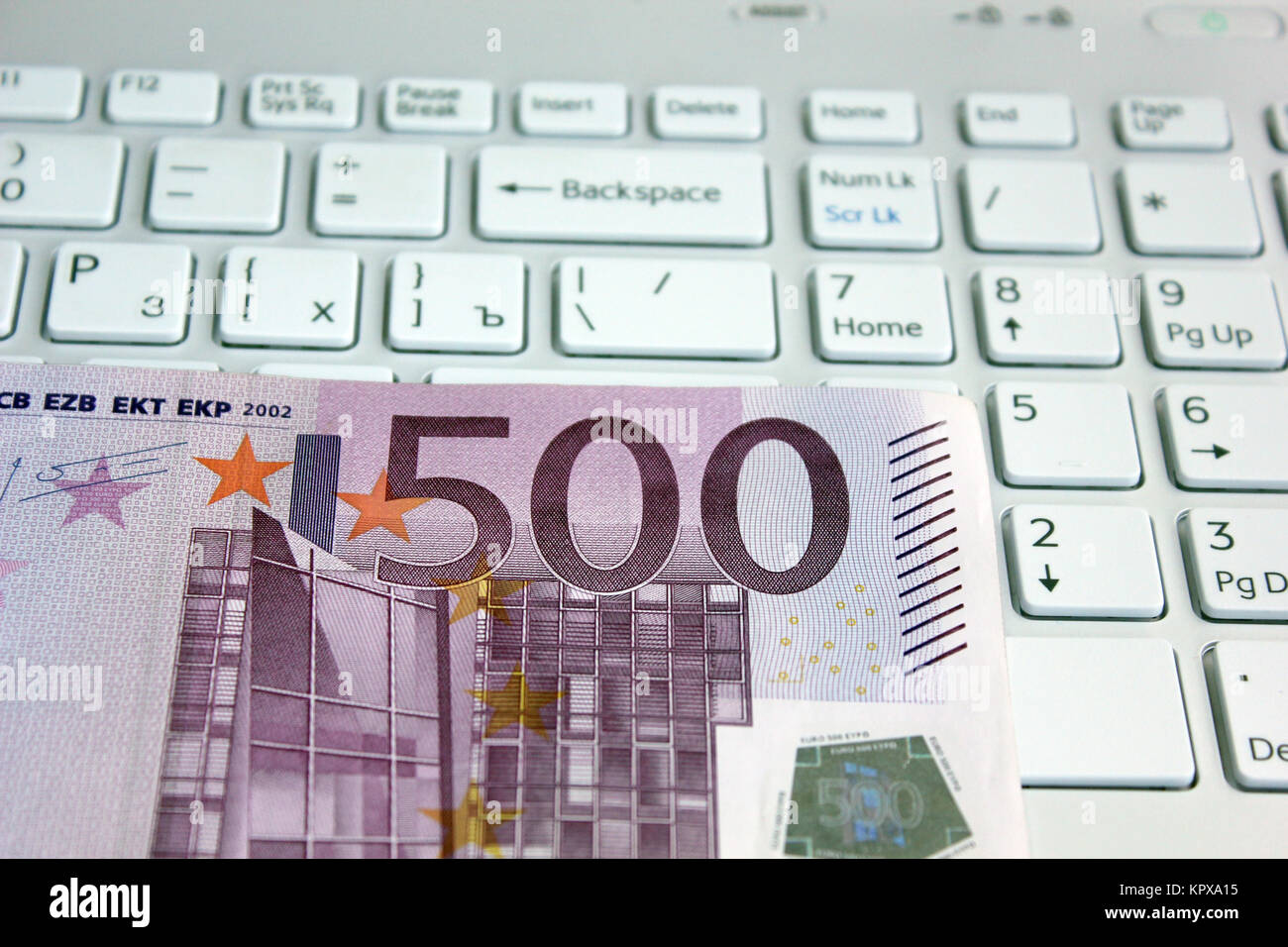 Euro and computer Stock Photo - Alamy
