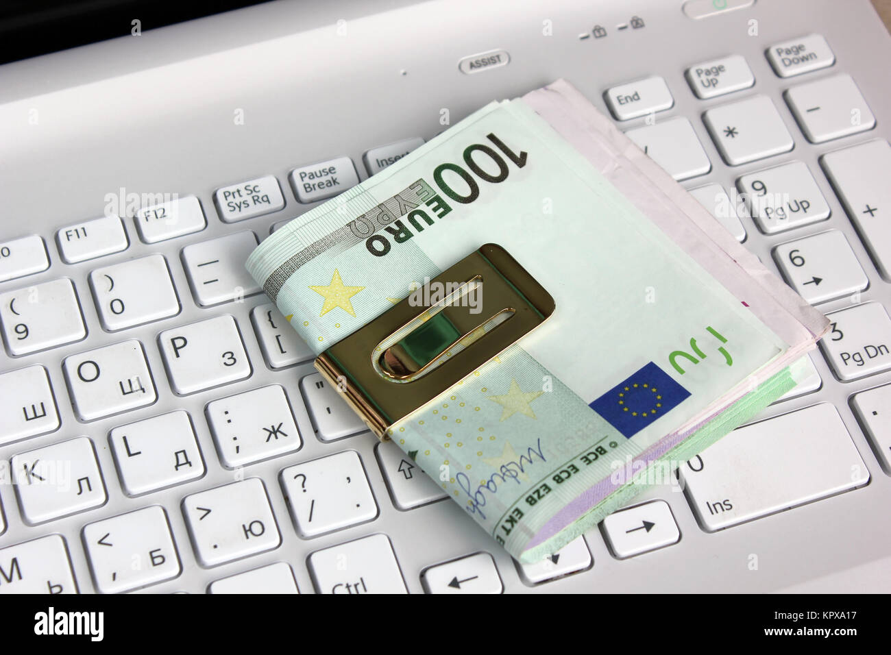 Euro and computer Stock Photo - Alamy