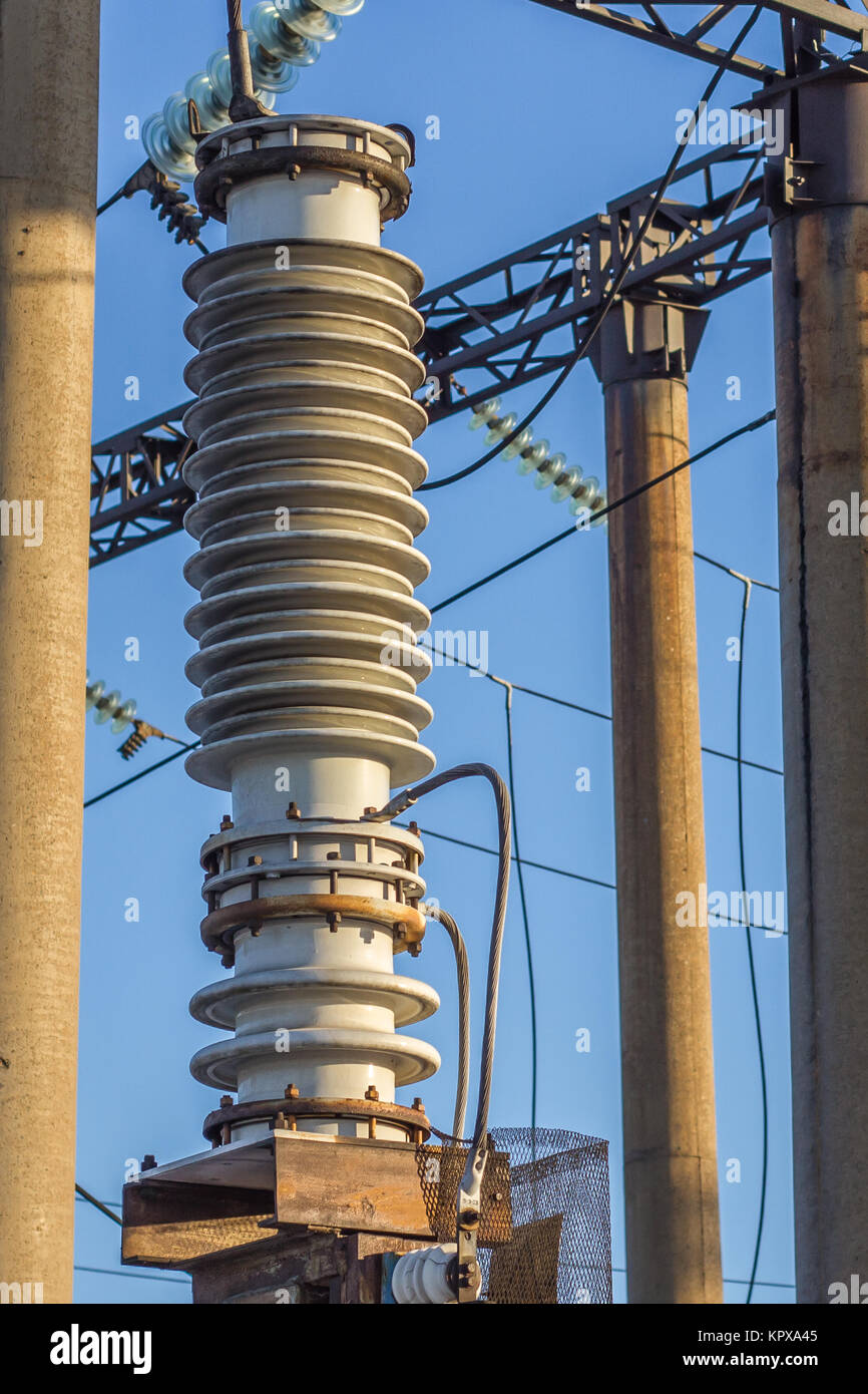 electric insulator on the background of blue sky Stock Photo - Alamy