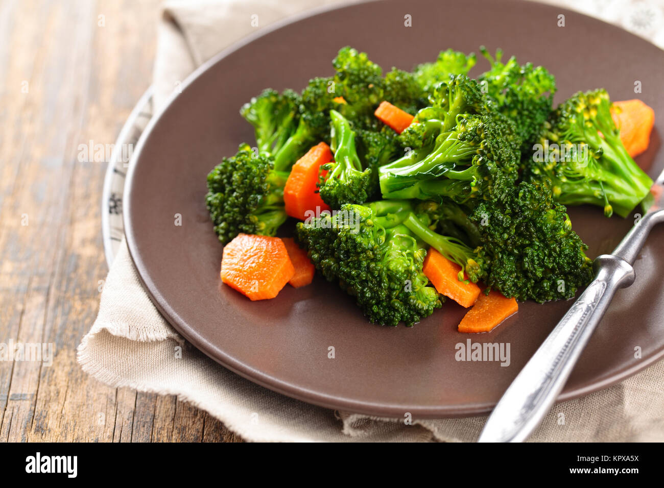 Steamed broccoli on plate Stock Photo - Alamy