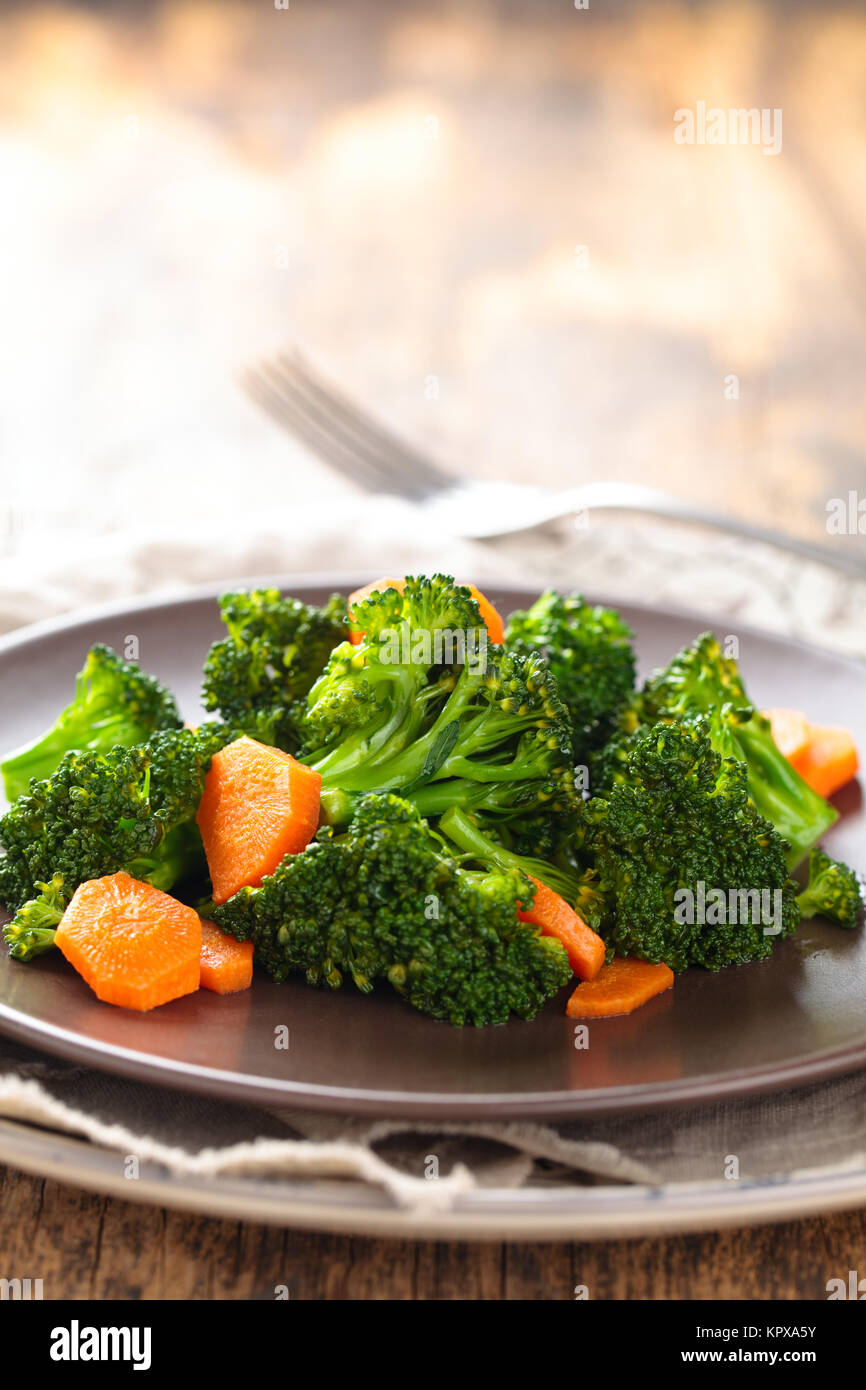 Steamed broccoli on plate Stock Photo - Alamy