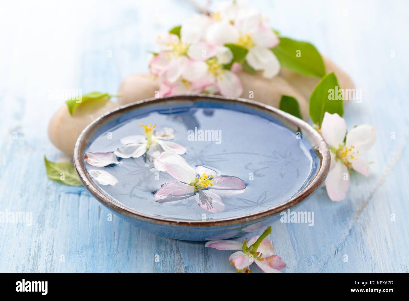 Scented water and flowers Stock Photo - Alamy
