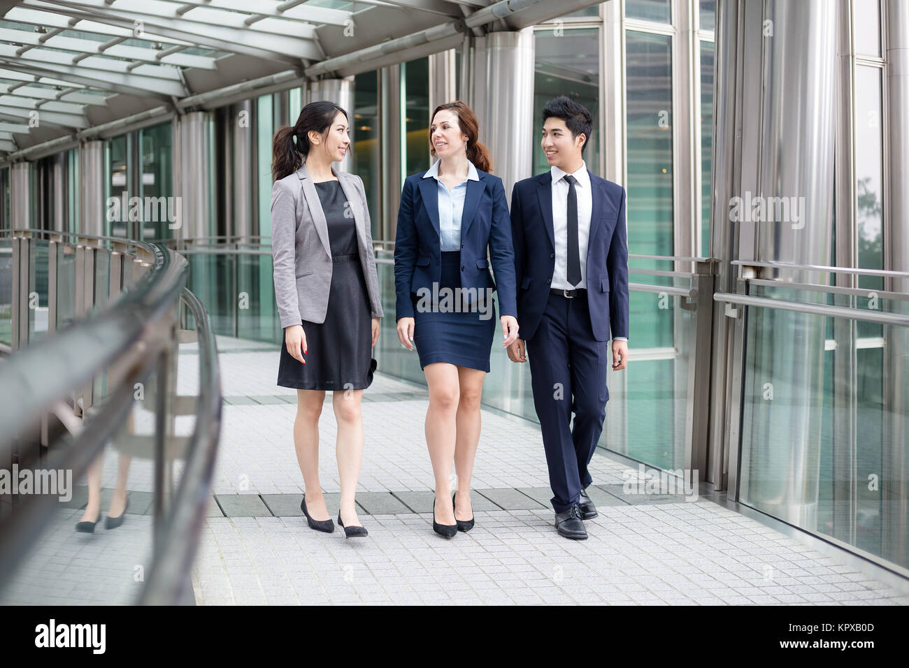 Business people walking at outdoor Stock Photo - Alamy