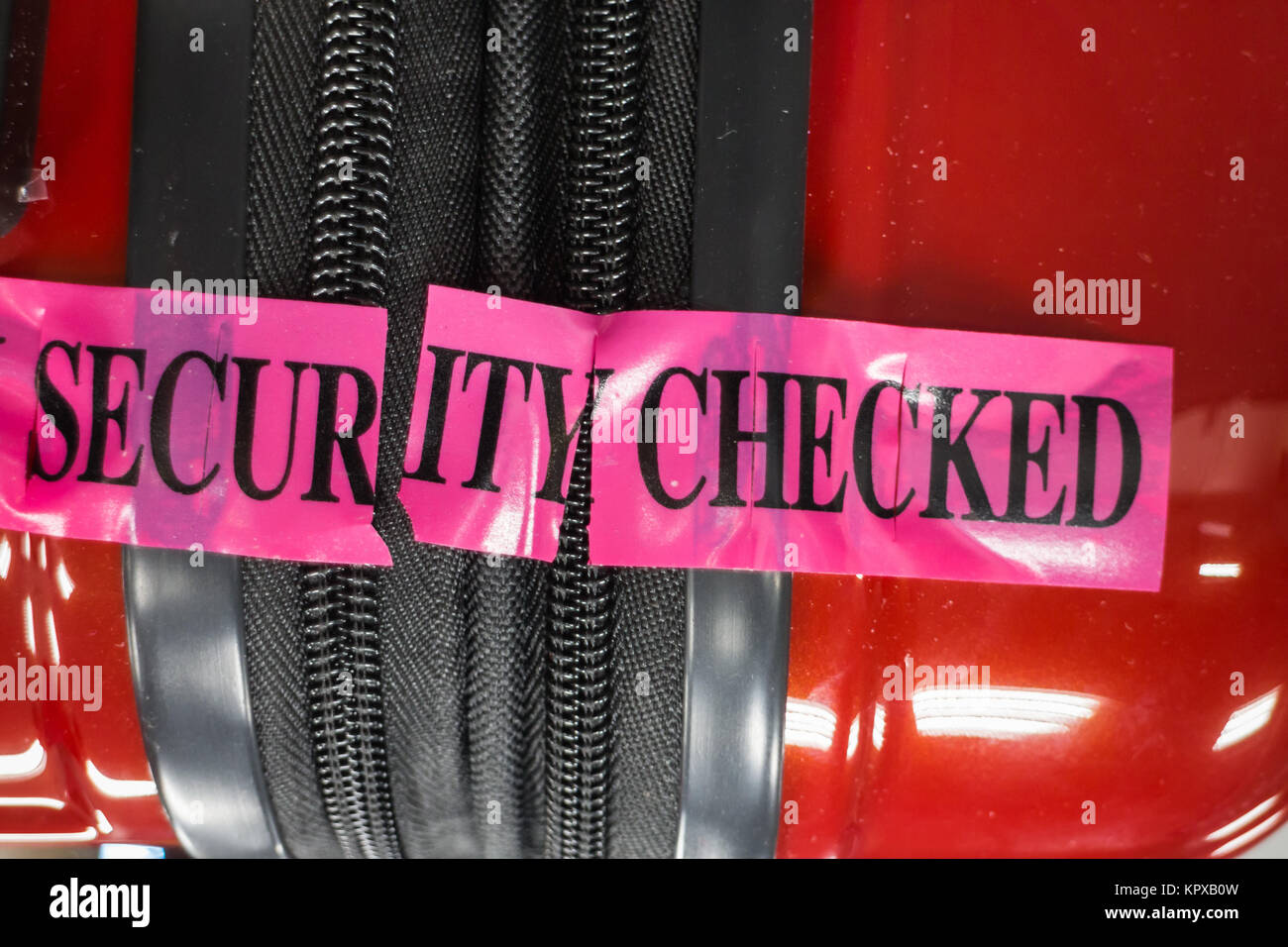 Security checked sticker hi-res stock photography and images - Alamy