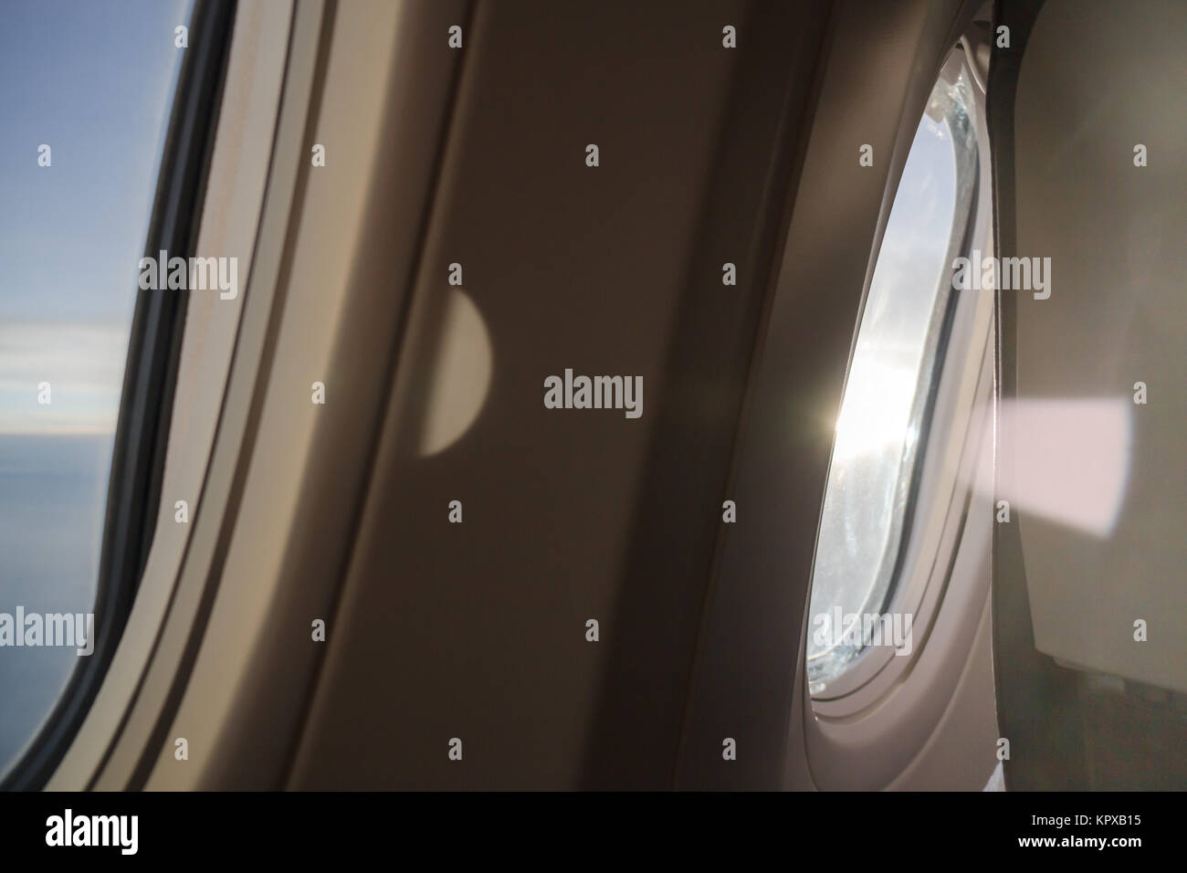 Natural sun light to airplane cabin Stock Photo - Alamy