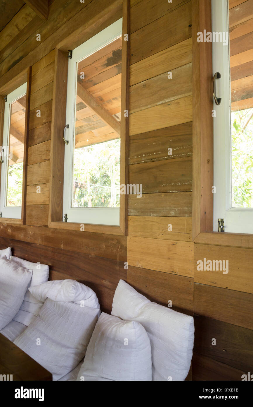 Wooden interior living room with window Stock Photo - Alamy