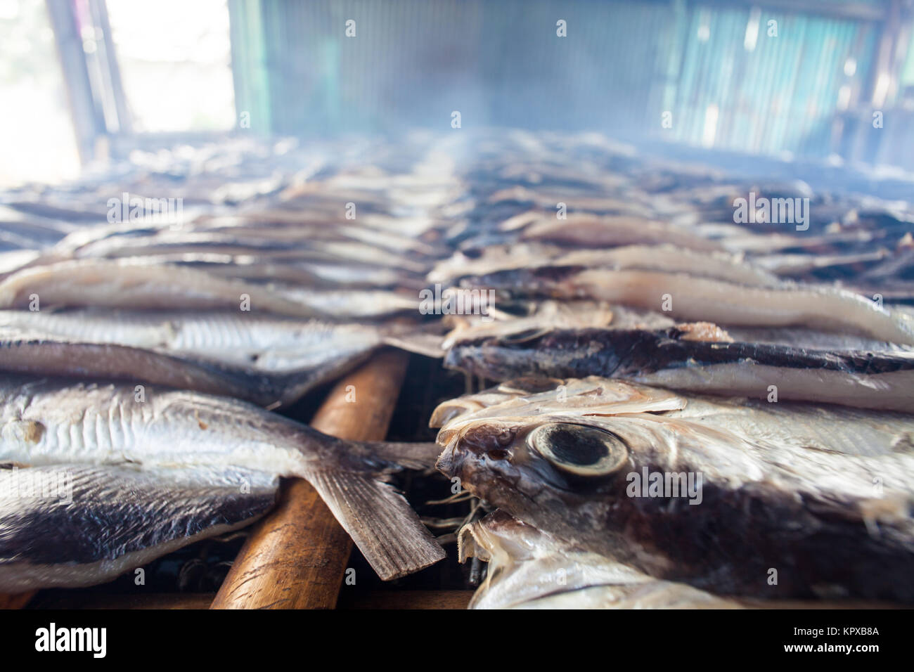 Smoked fish on plate in the summer, Taiwan Stock Photo - Alamy