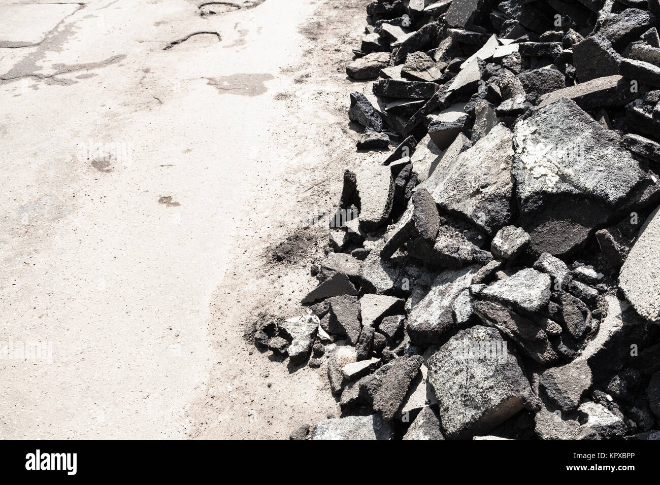 heap of old asphalt pieces on roadside Stock Photo - Alamy