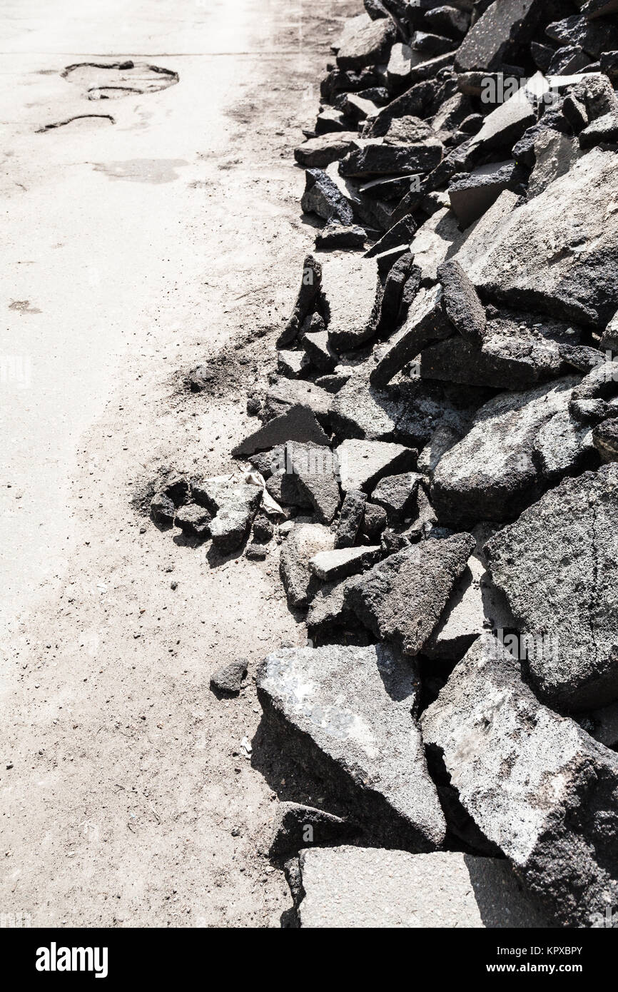 pile of asphalt pieces on roadside Stock Photo - Alamy