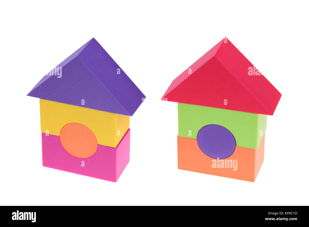 Toy house made of plastic bricks on white background Stock Photo - Alamy