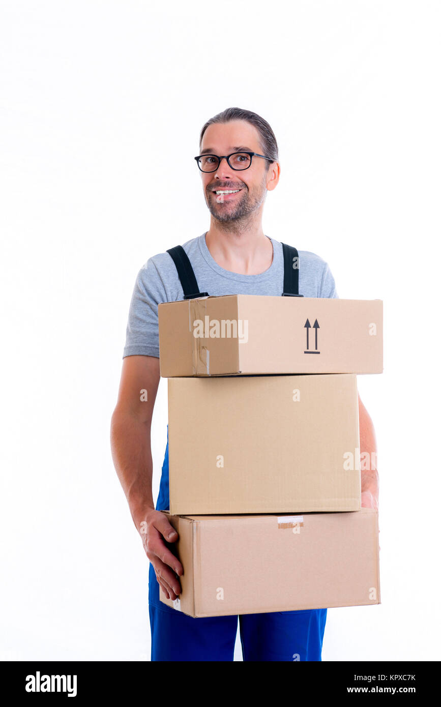 friendly postman with parcels in front of white background Stock Photo ...