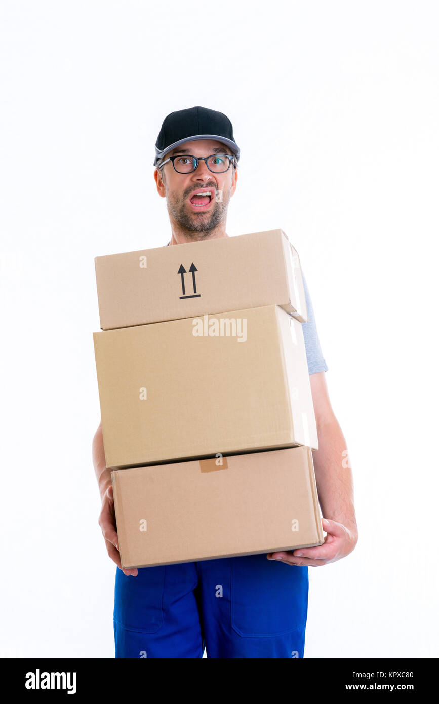 overstrained postman with parcels in front of white background Stock ...