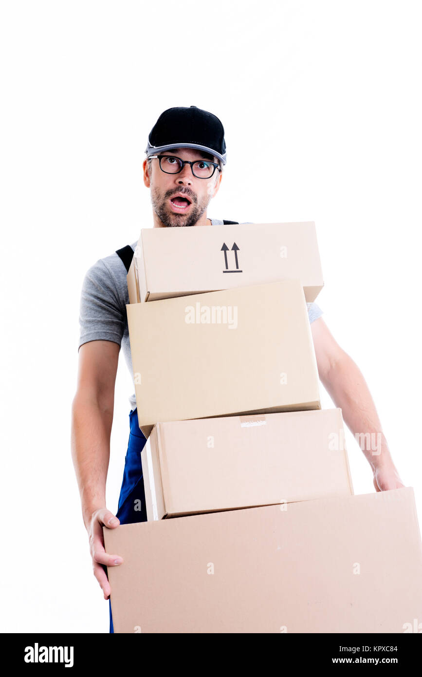 overstrained postman with parcels in front of white background Stock ...