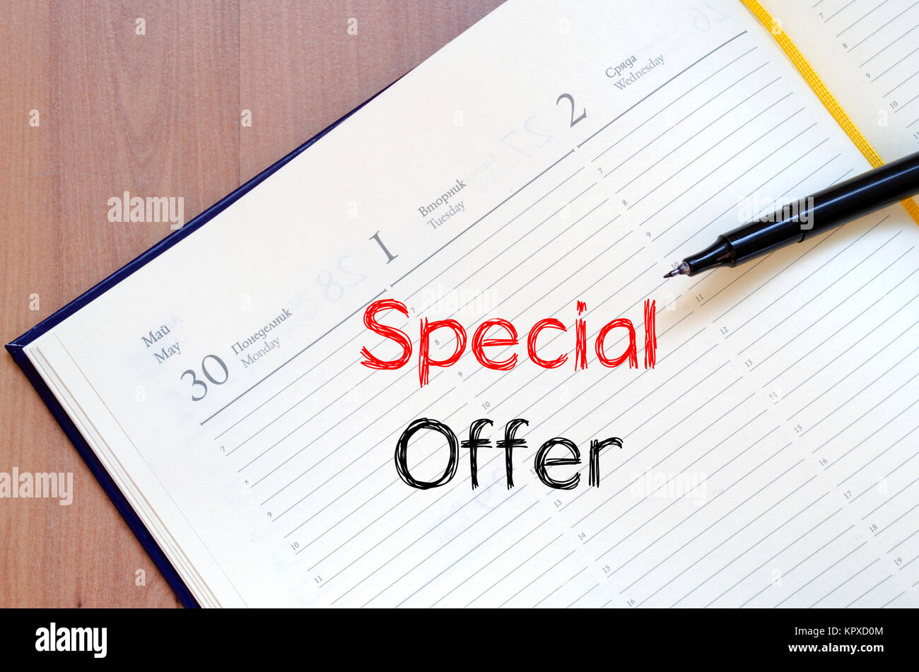 Special offer write on notebook Stock Photo - Alamy