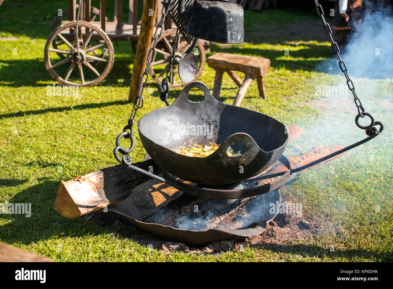boiling over the fire Stock Photo - Alamy