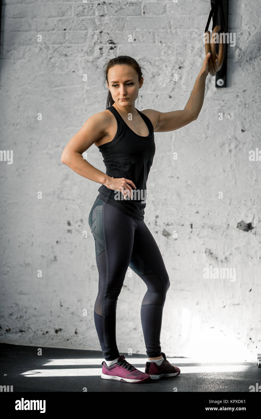 Fitness dip ring woman workout at gym dipping exercise Stock Photo - Alamy