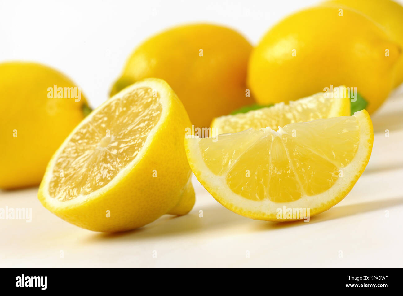 whole and sliced lemons Stock Photo - Alamy