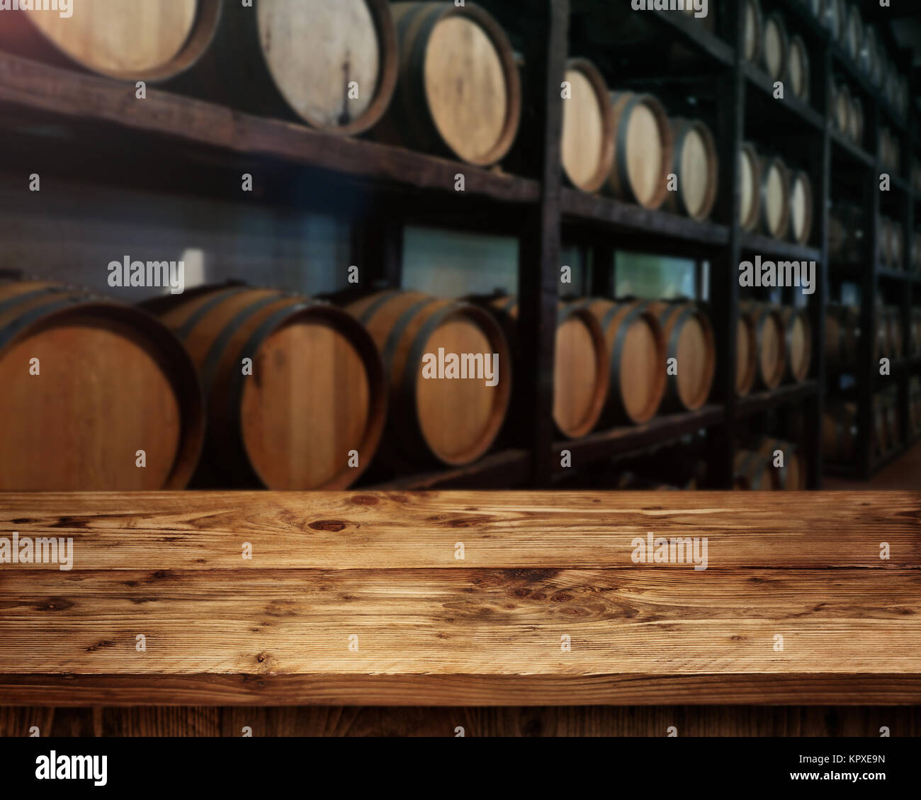 rustic wooden table in a wine cellar Stock Photo - Alamy