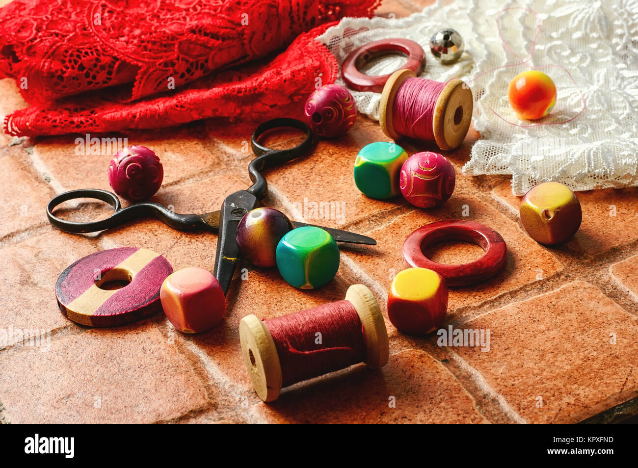 Jewelry,scissors, and beads for making women's jewelry Stock Photo - Alamy