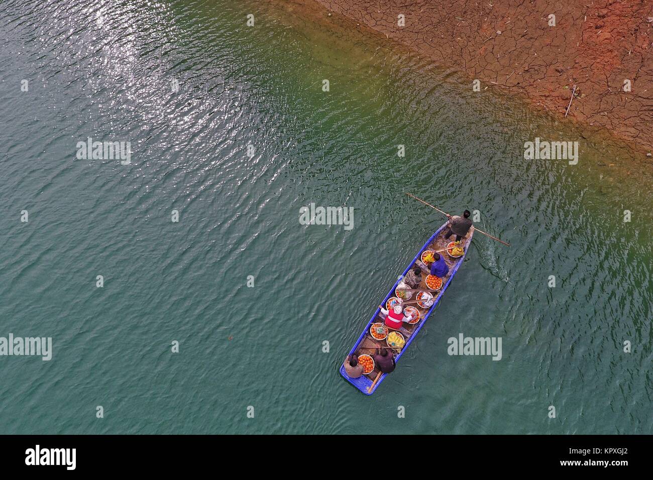 Rongjiang, China's Guizhou Province. 17th Dec, 2017. Villagers take a ...