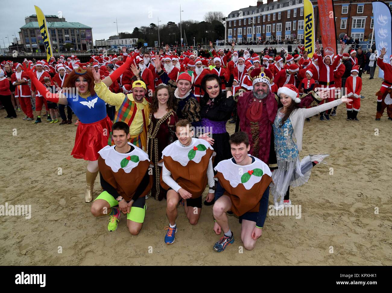 Chase the Pudding Santa race on Weymouth beach, Dorset, UK Credit ...