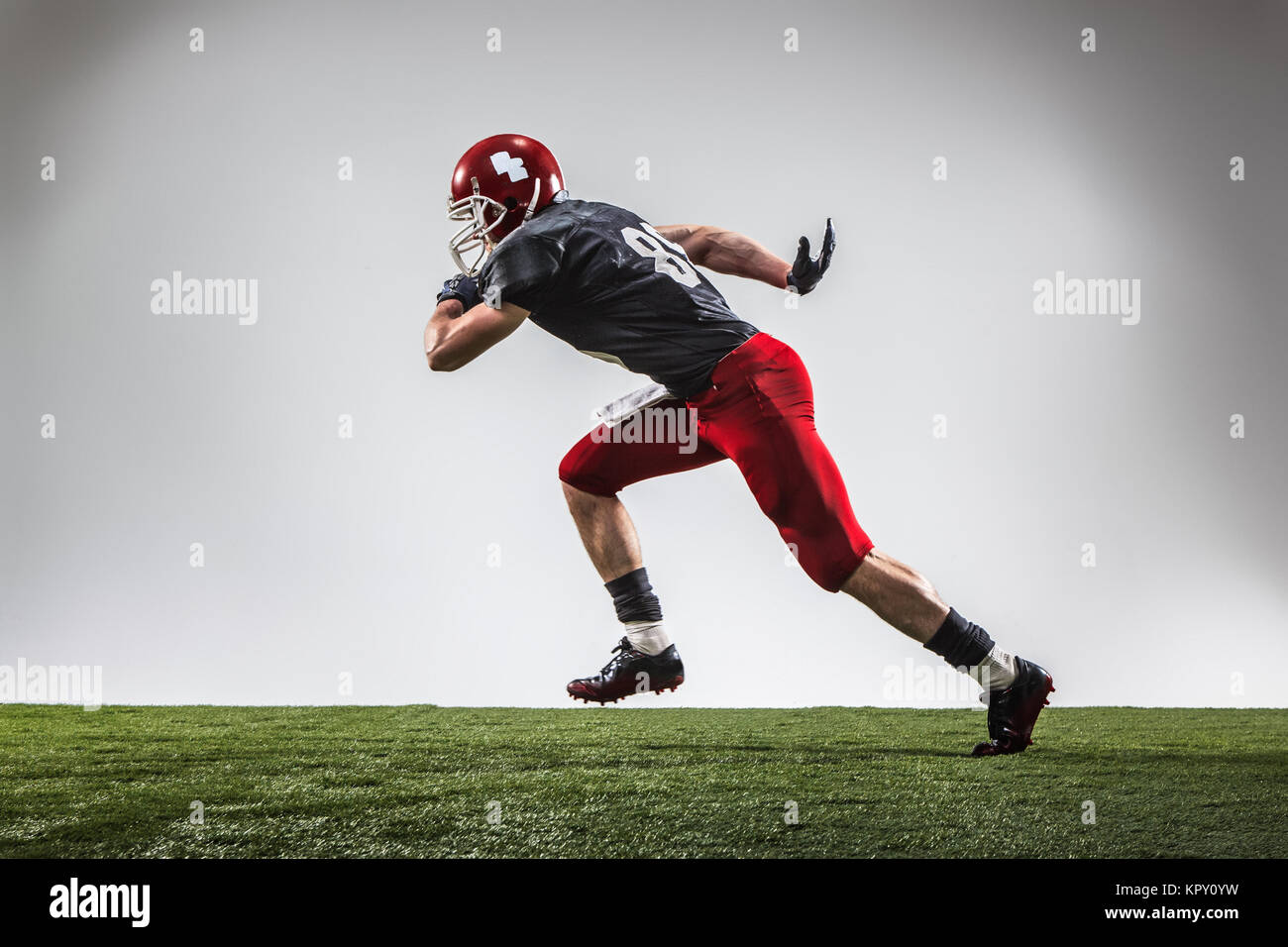 The american football player in action Stock Photo - Alamy