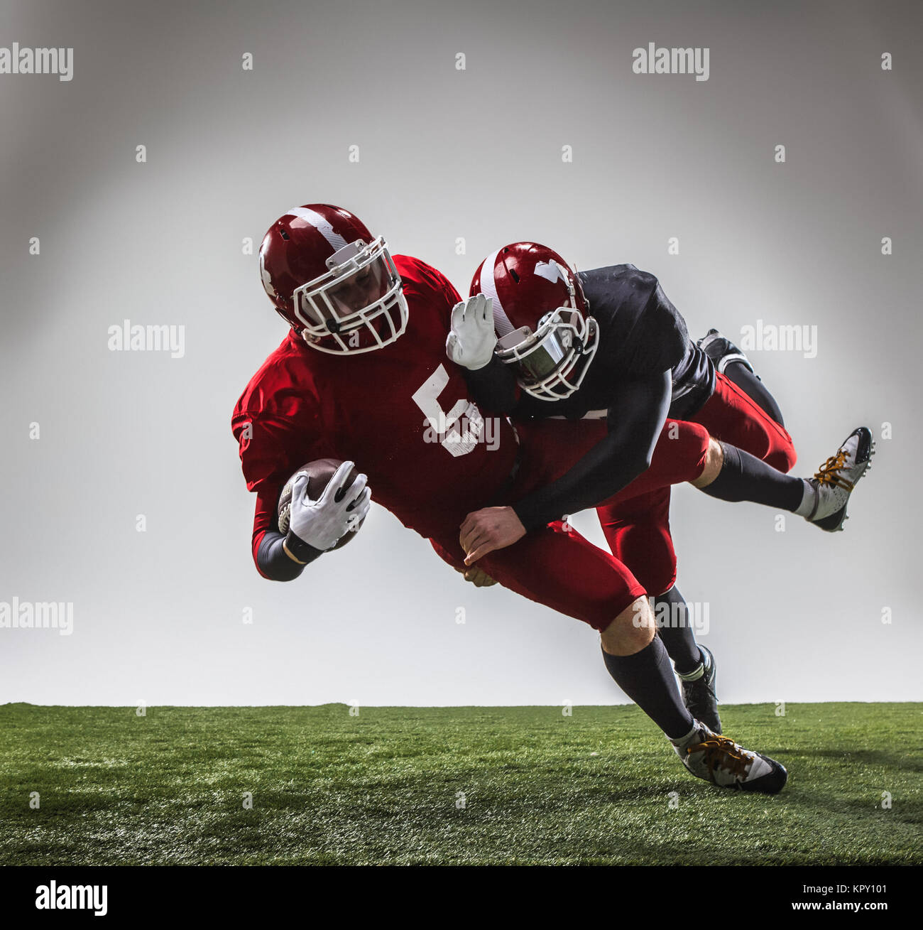Two male soccer players jumping hi-res stock photography and images - Alamy