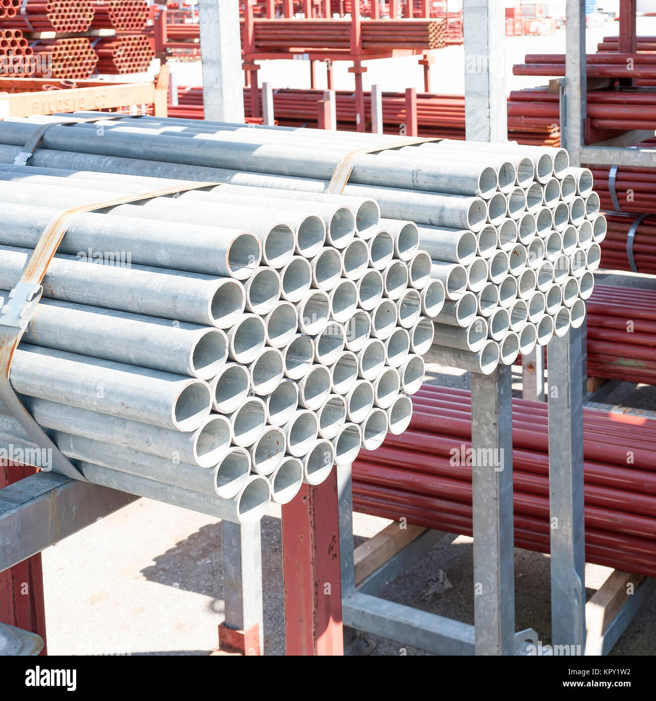 Stack of steel pipes for scaffolding in stock Stock Photo - Alamy