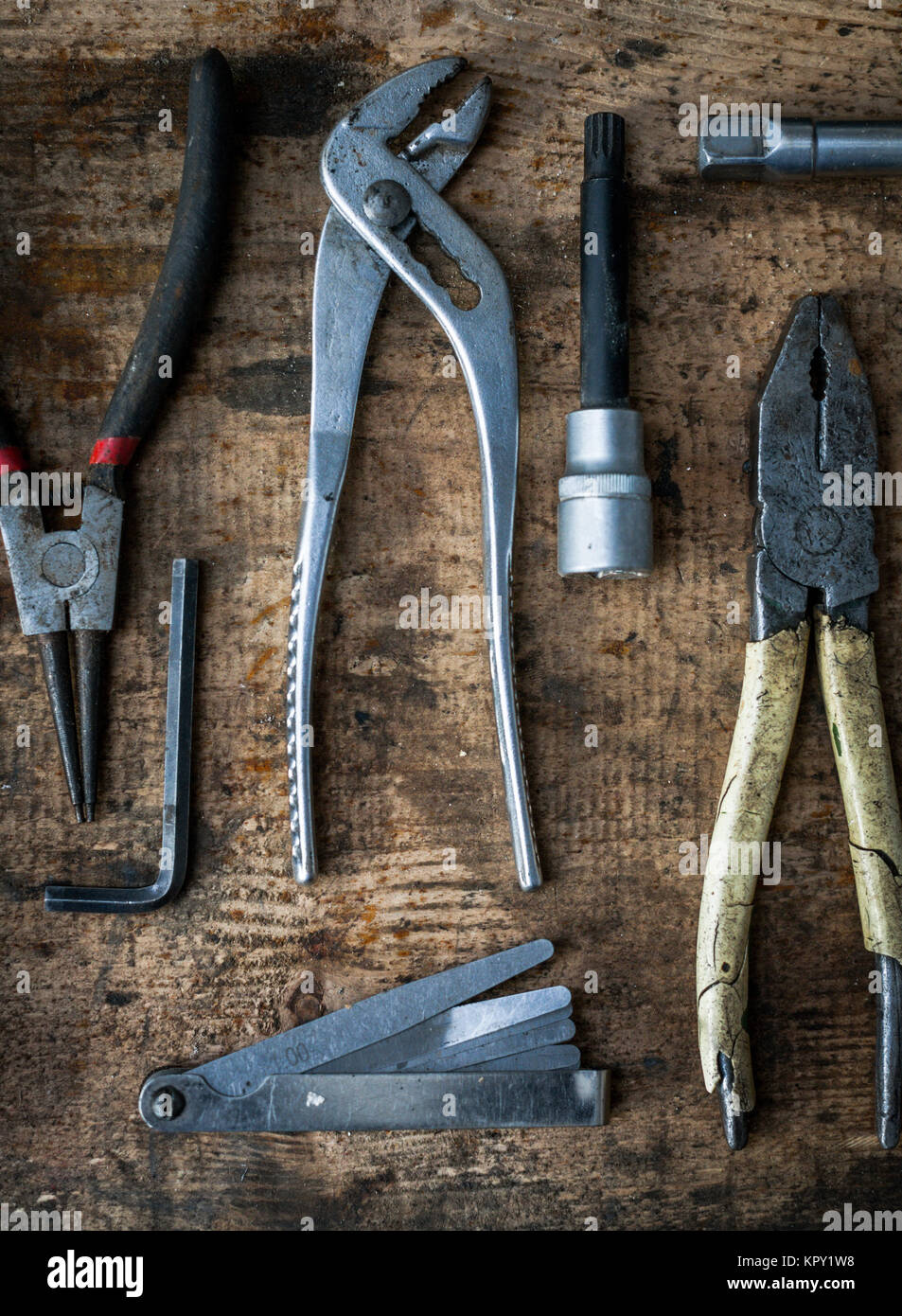 Tools on wooden plank Stock Photo - Alamy