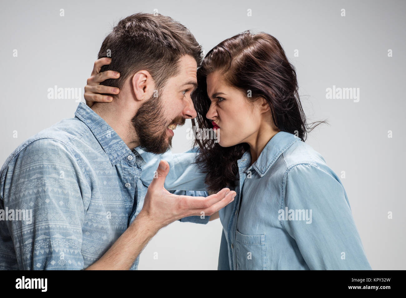 The young couple with different emotions during conflict Stock Photo ...