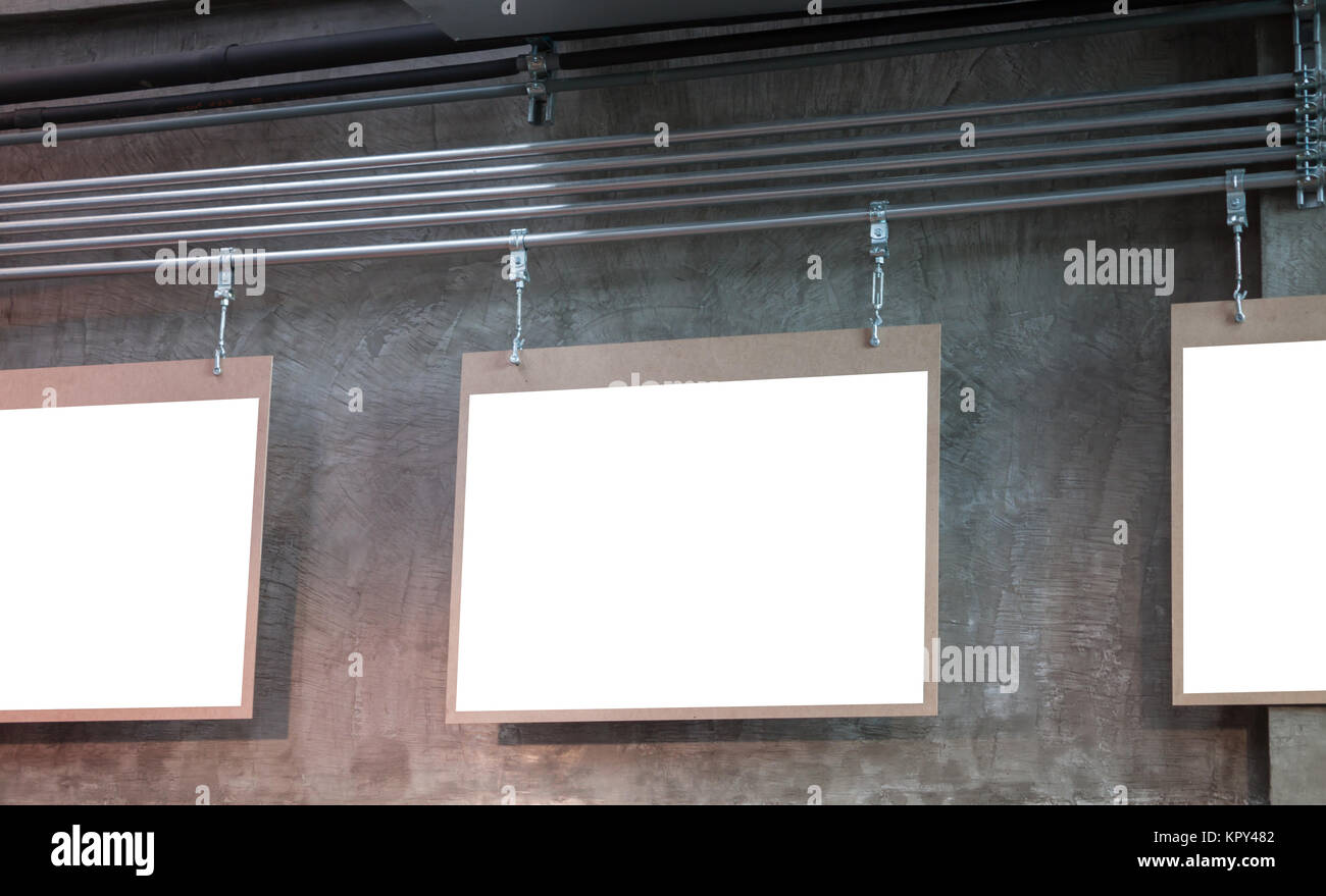 Hanging blank board with grey background Stock Photo - Alamy