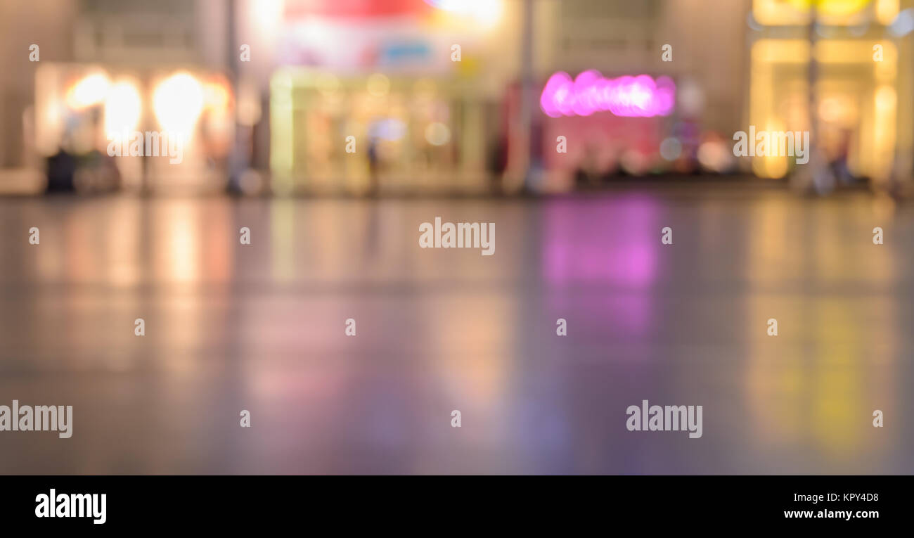 Blurred image of shopping mall with shining lights Stock Photo - Alamy