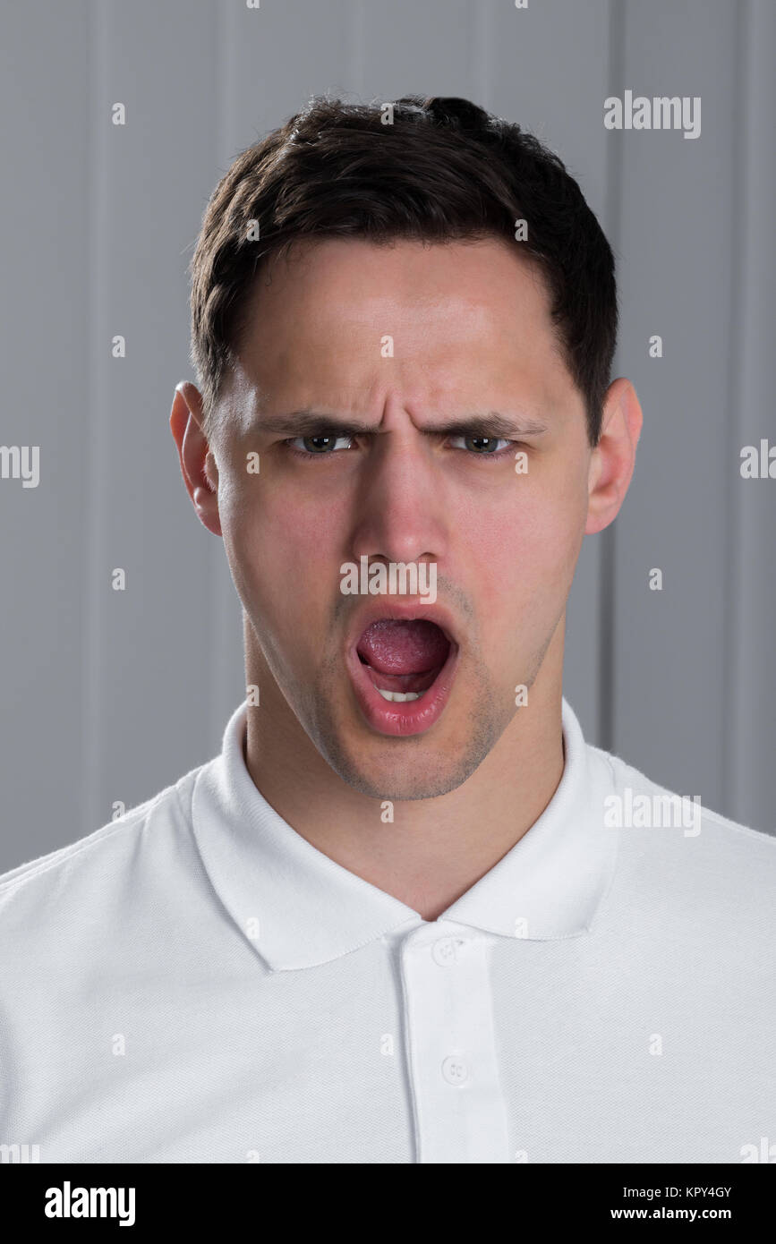 Portrait Of Man Screaming Stock Photo - Alamy