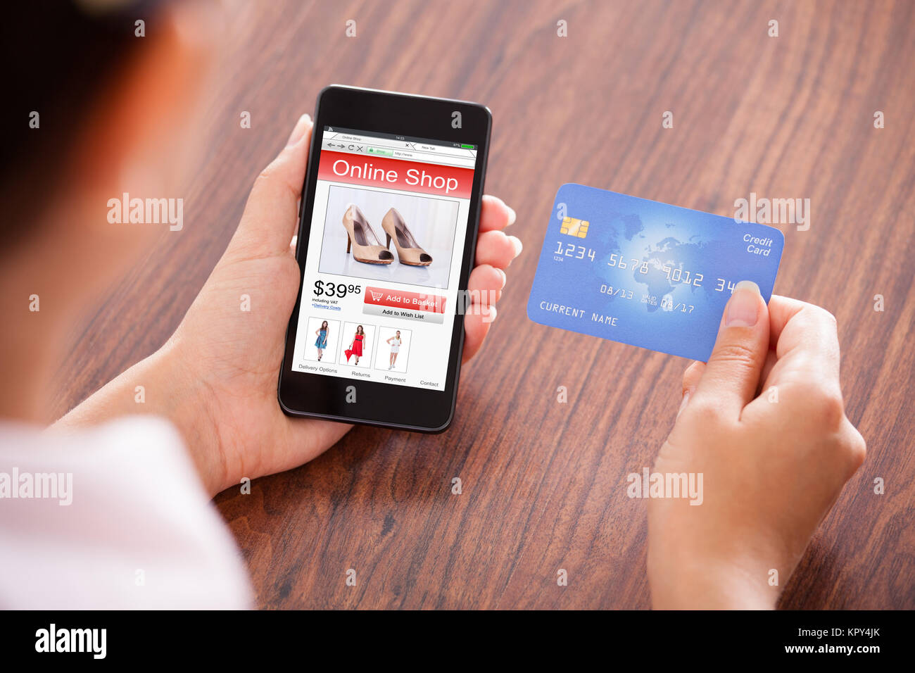 Businesswoman Making Payment On Mobile Phone Stock Photo - Alamy