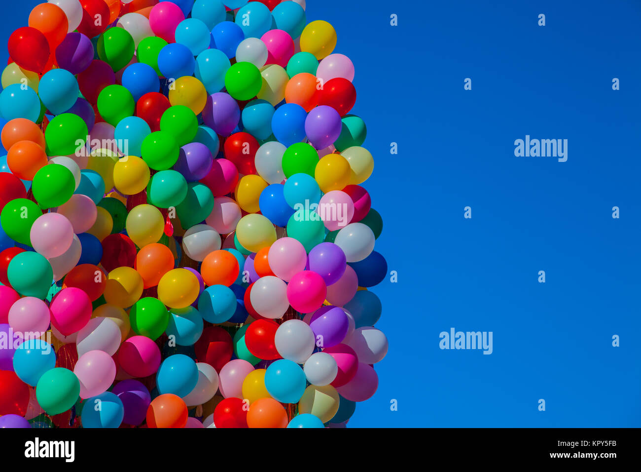 A lot of coloured flyiing balloons during an italian holiday Stock ...