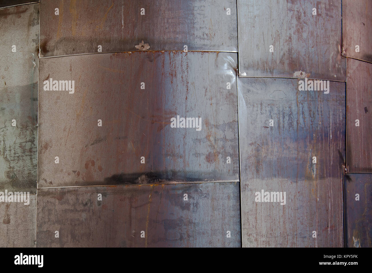 A wall made with rusty big panels Stock Photo - Alamy