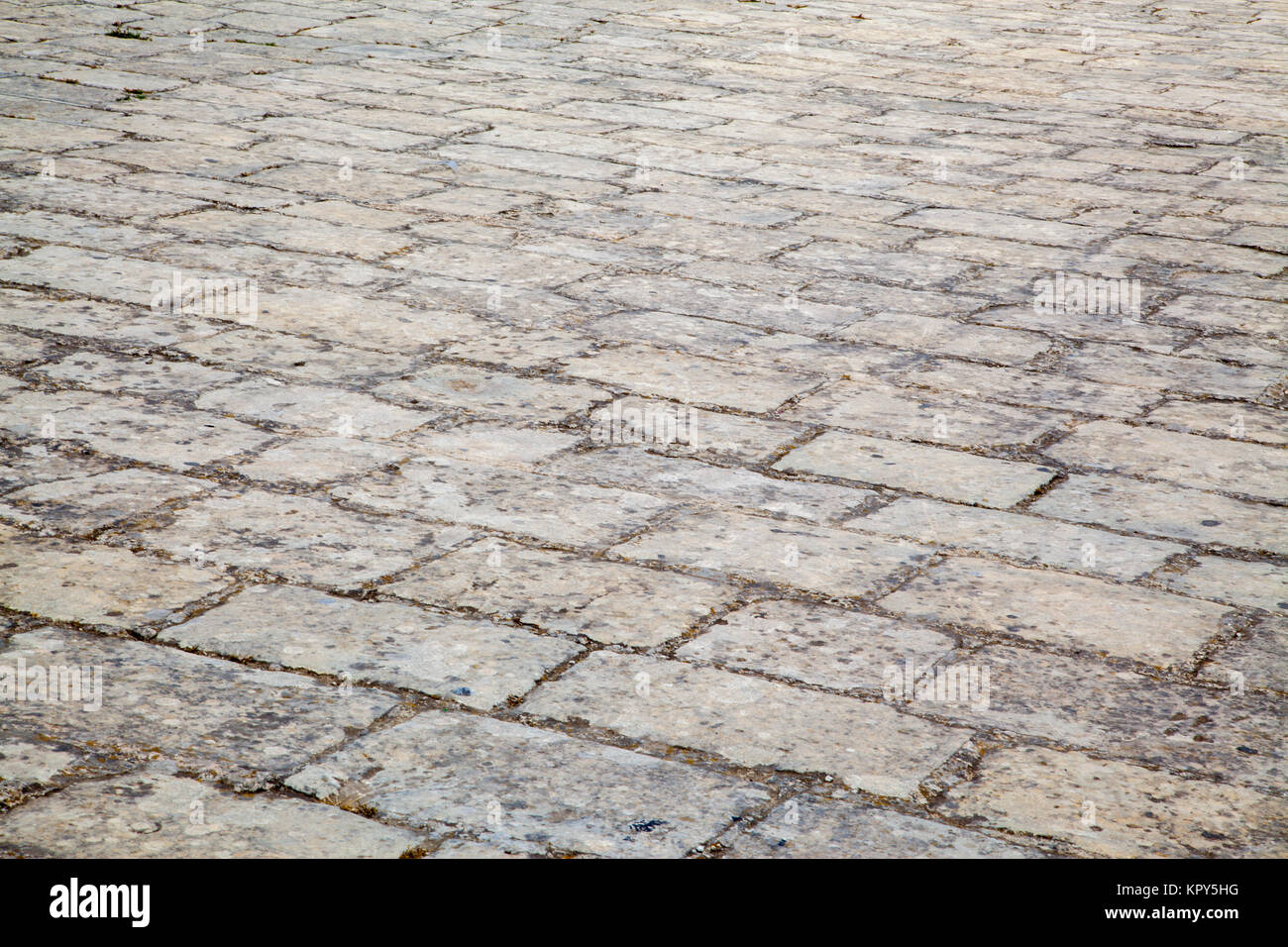 Ruined floor made with patterned grey bricks Stock Photo - Alamy